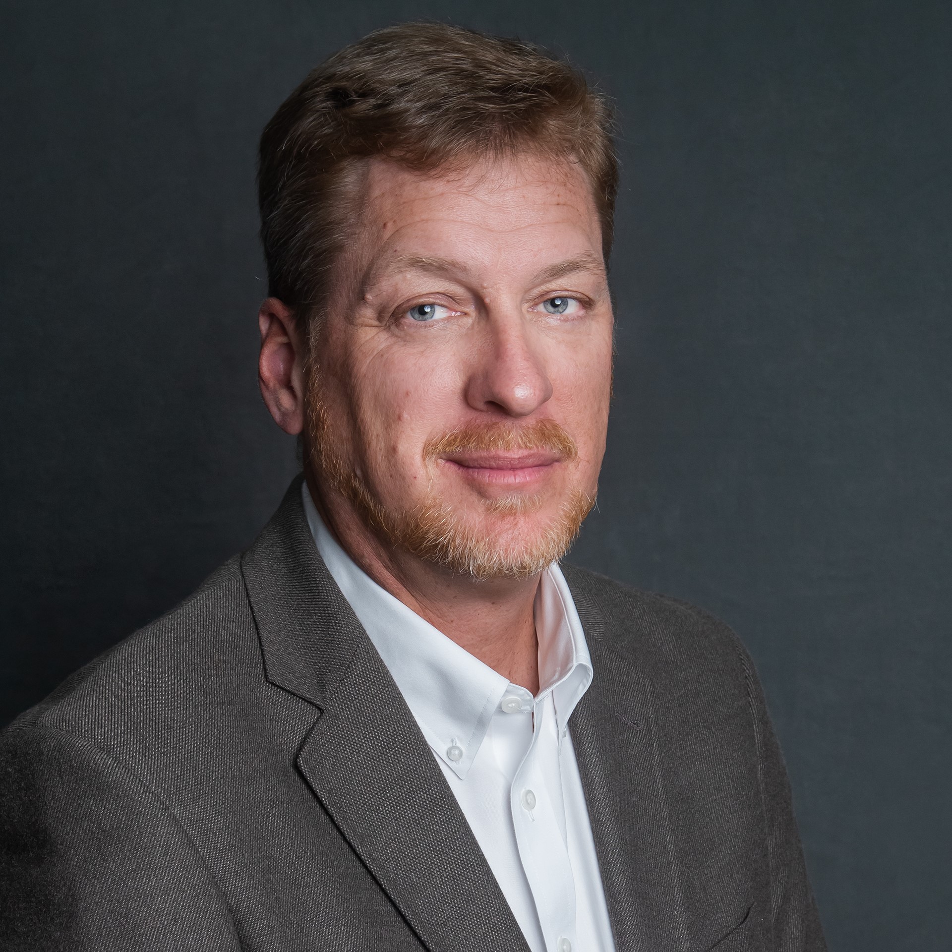 Mike Rhoades - The OPEN MINDS Service Excellence Institute